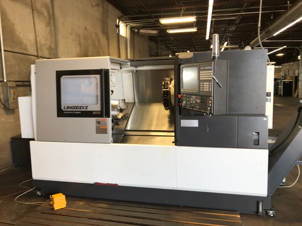Used OKUMA LB4000EXII BB x 750 CNC Lathe 4679