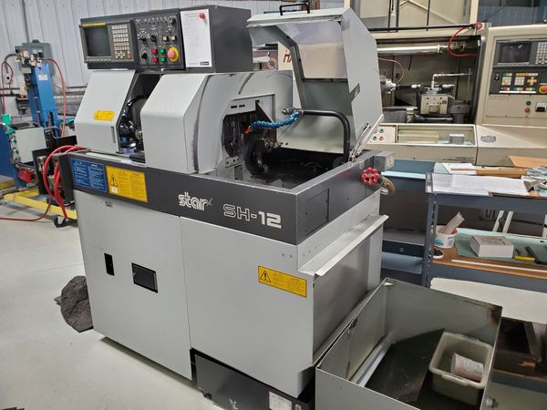 Used STAR SA12 CNC Lathe 3929