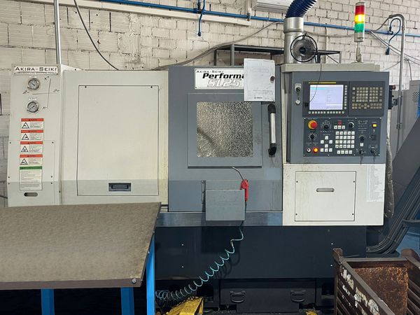 Used AKIRA SEIKI SL25 CNC Lathe #11211